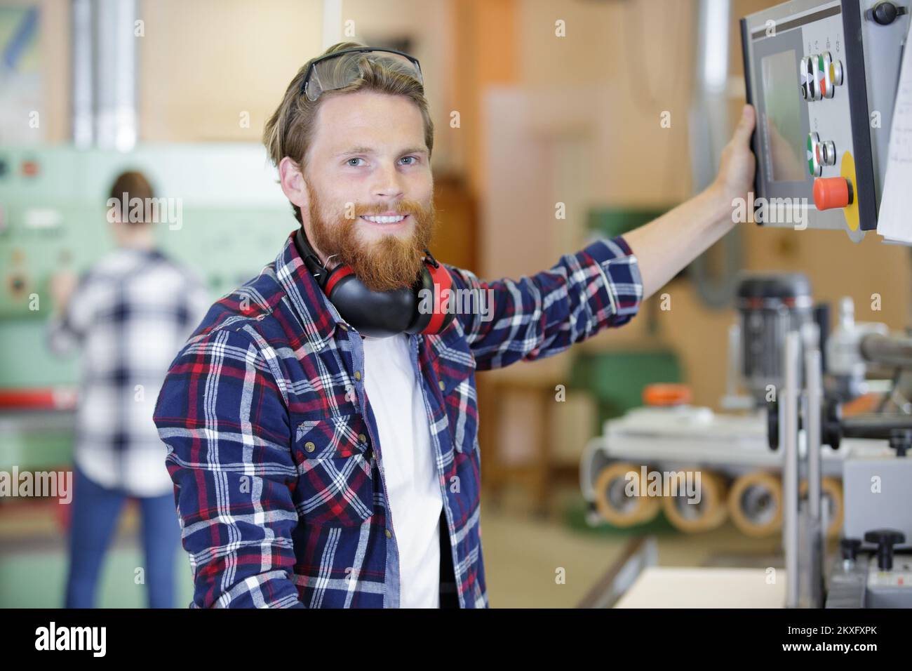 Old warehouse machine man hi-res stock photography and images - Alamy