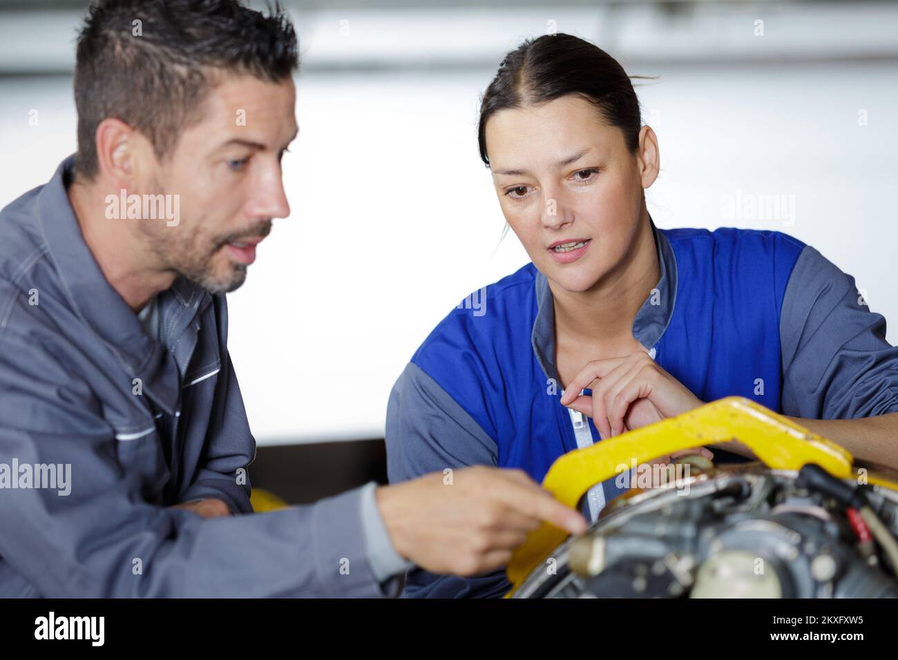 Two mechanics fix car hi-res stock photography and images - Alamy