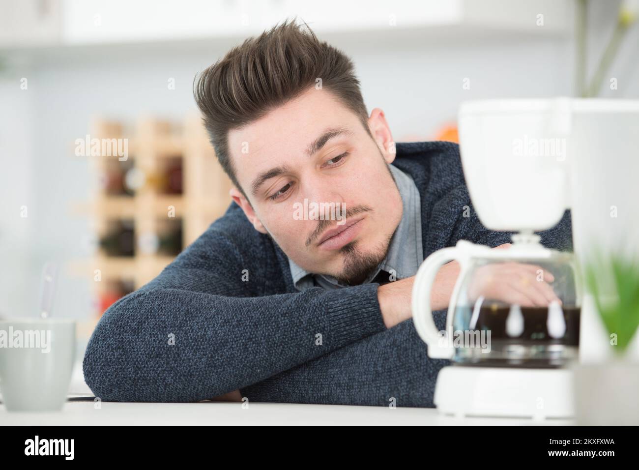 Man making espresso coffee moka hi-res stock photography and images - Alamy