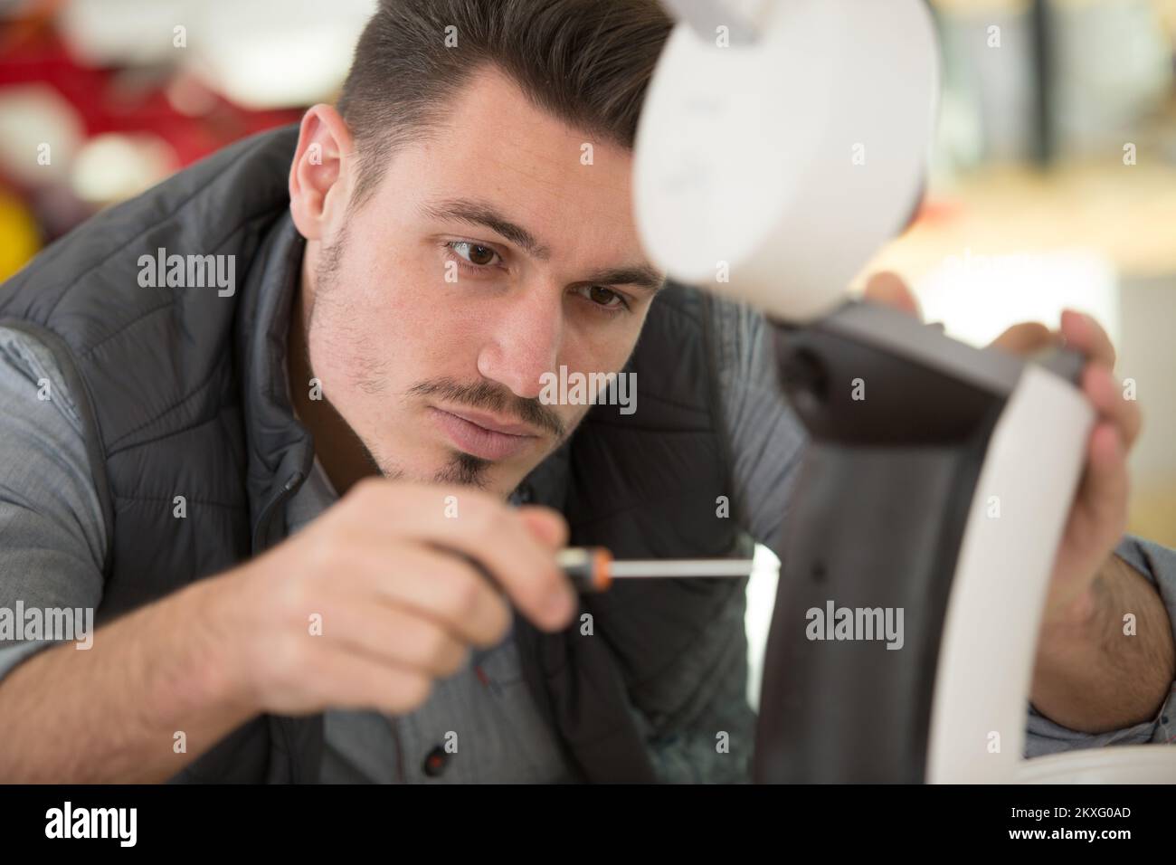 man with screwdriver Stock Photo - Alamy