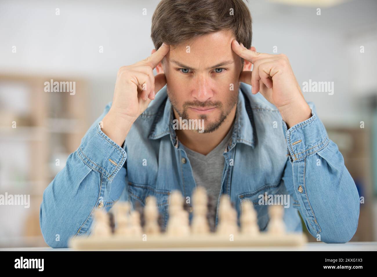 Pensive male chess player hi-res stock photography and images - Alamy