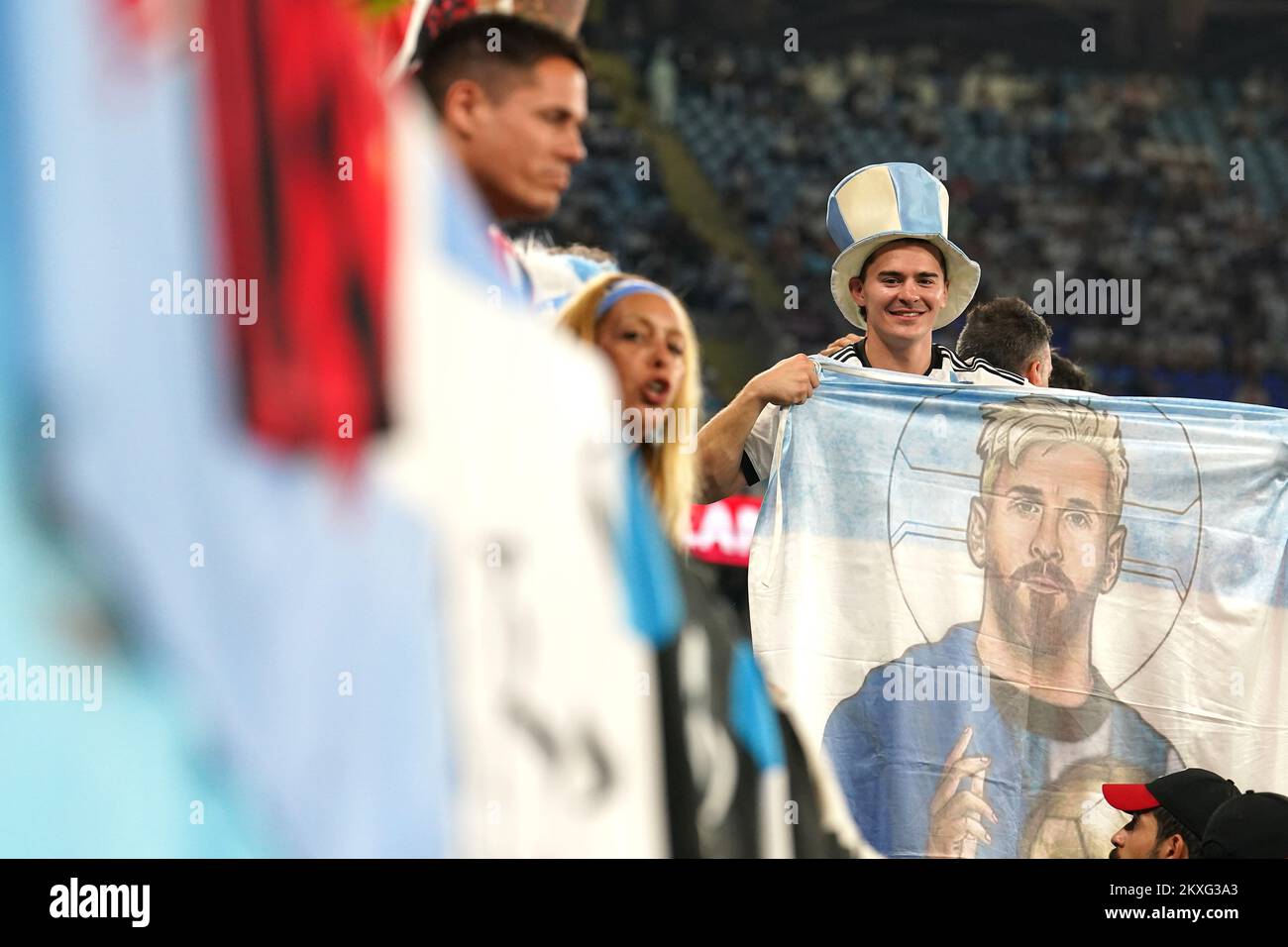 Argentina fan holds up a flag of Lionel Messi before the FIFA World Cup ...