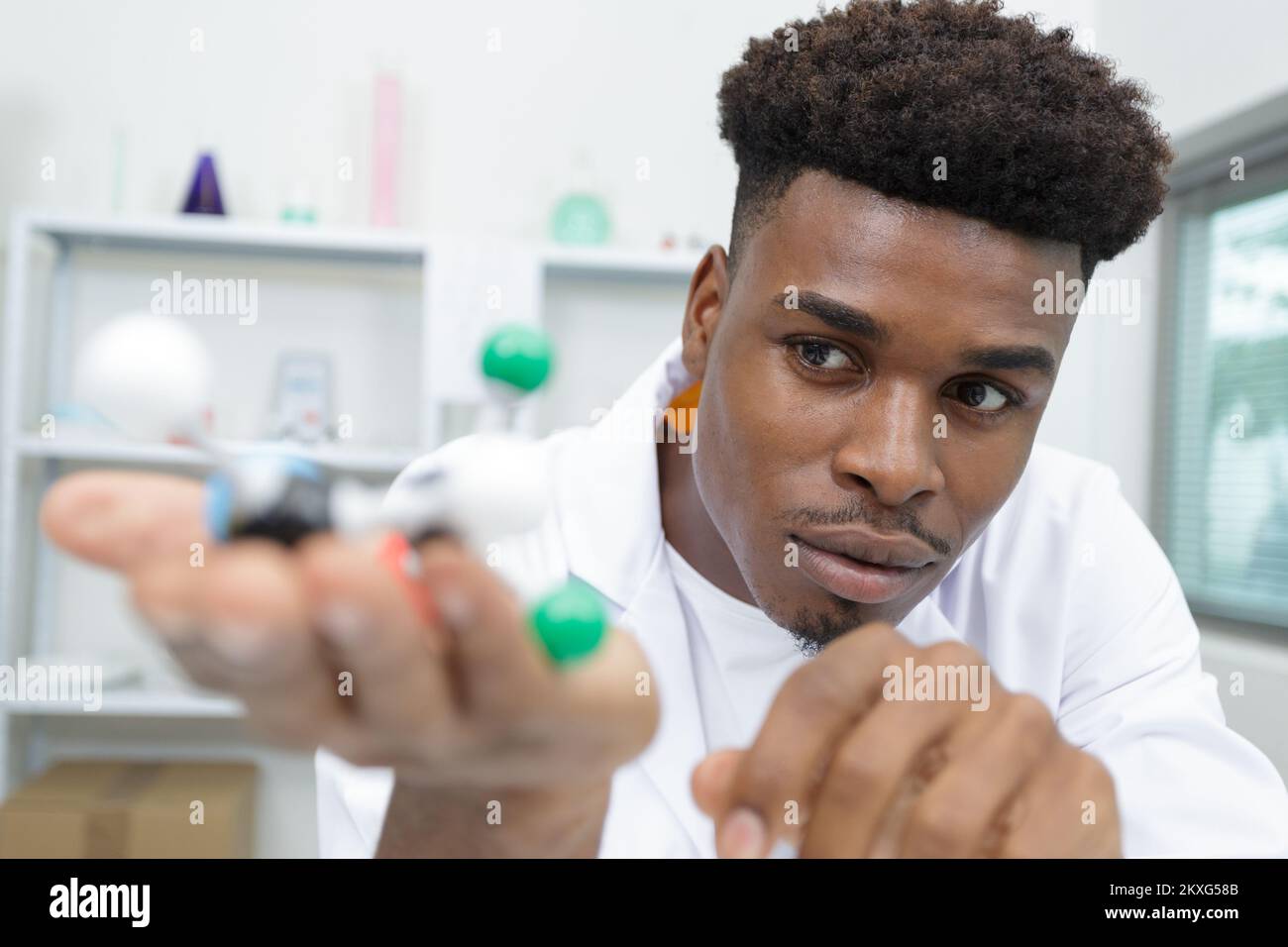 male scientist experimenting molecule structure Stock Photo - Alamy