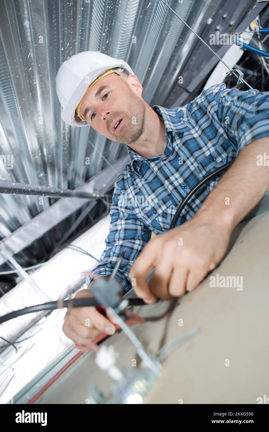 Row power line support hi-res stock photography and images - Alamy