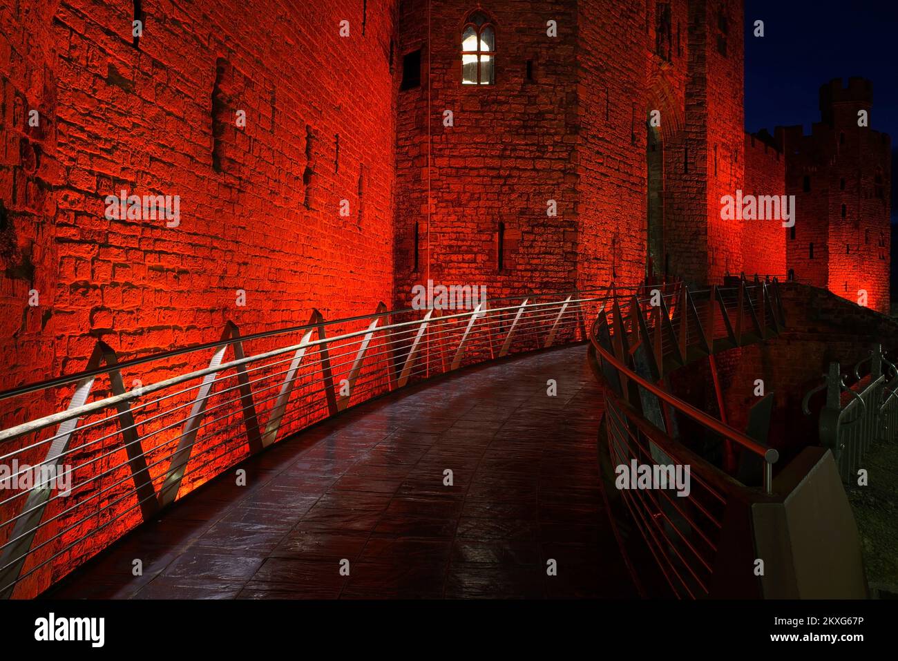 Caernarfon Castle, illuminated red to commemorate Wales Football team ...