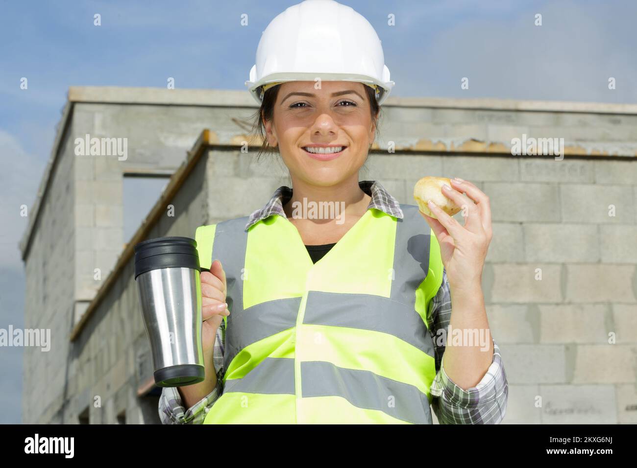 female builder on a tea break Stock Photo - Alamy