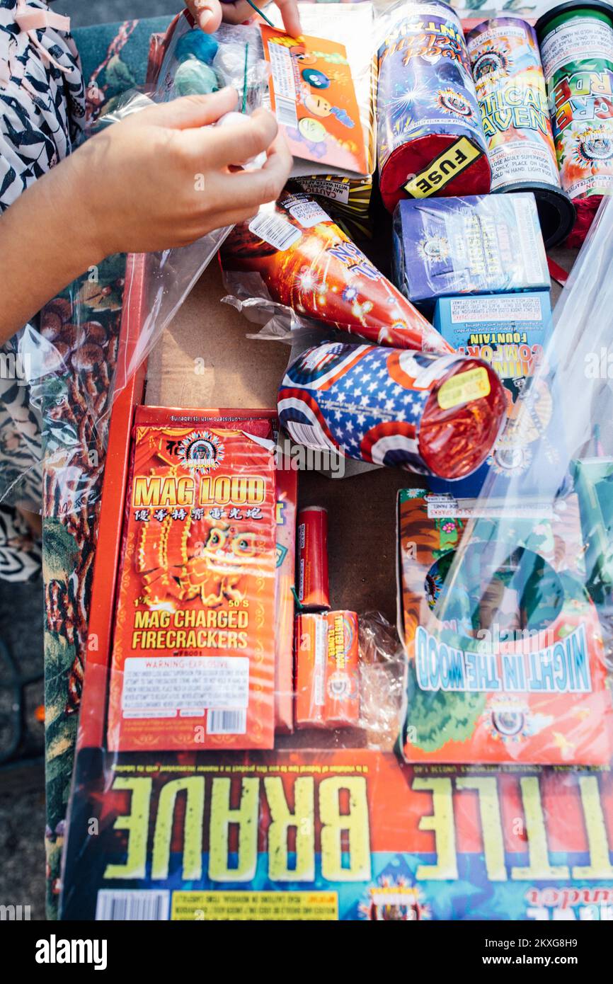 child opening a big set of fireworks, firecrackers Stock Photo - Alamy