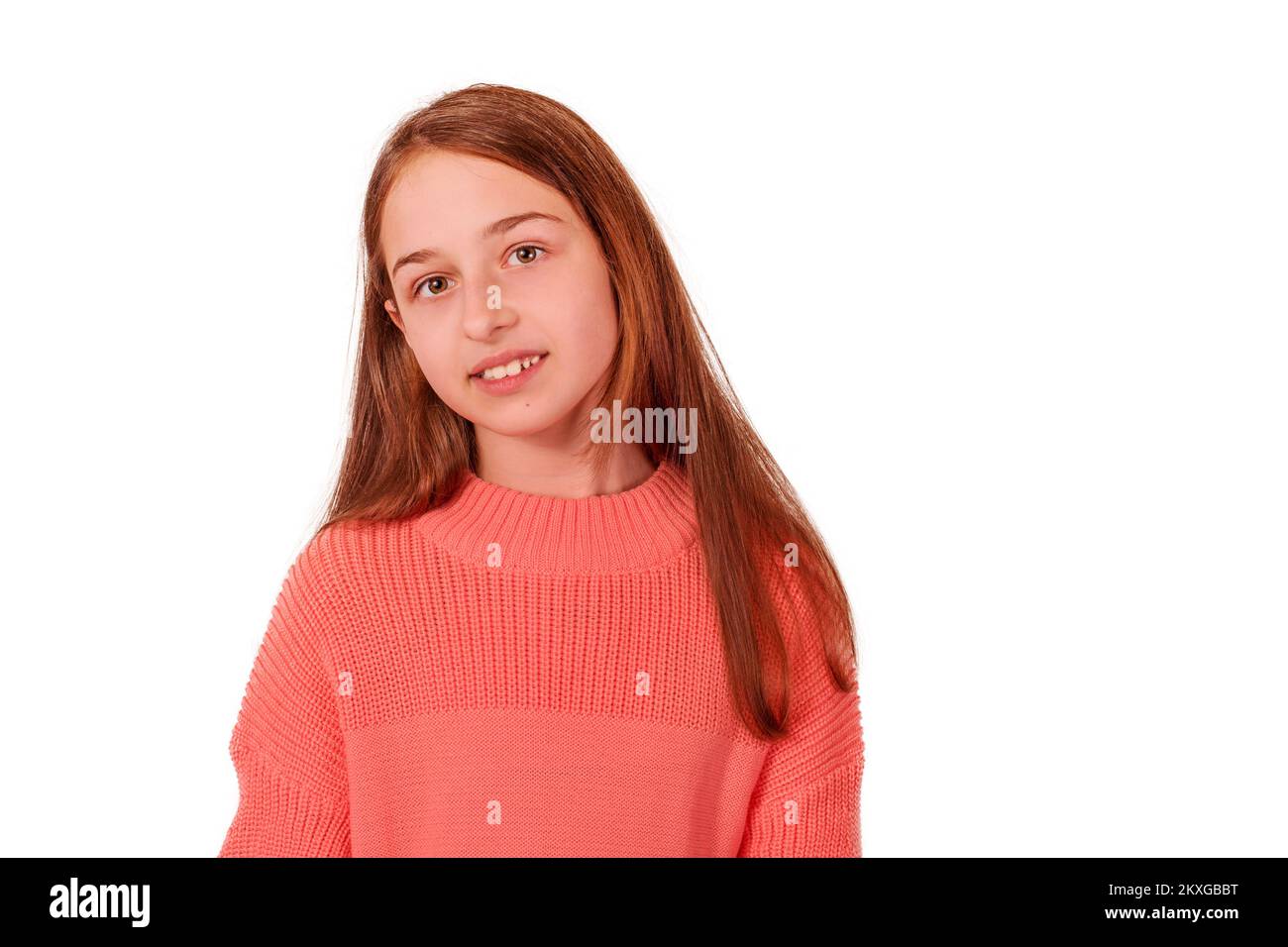 Portrait of a teenage girl. Girl 11 years old in a pink sweater ...