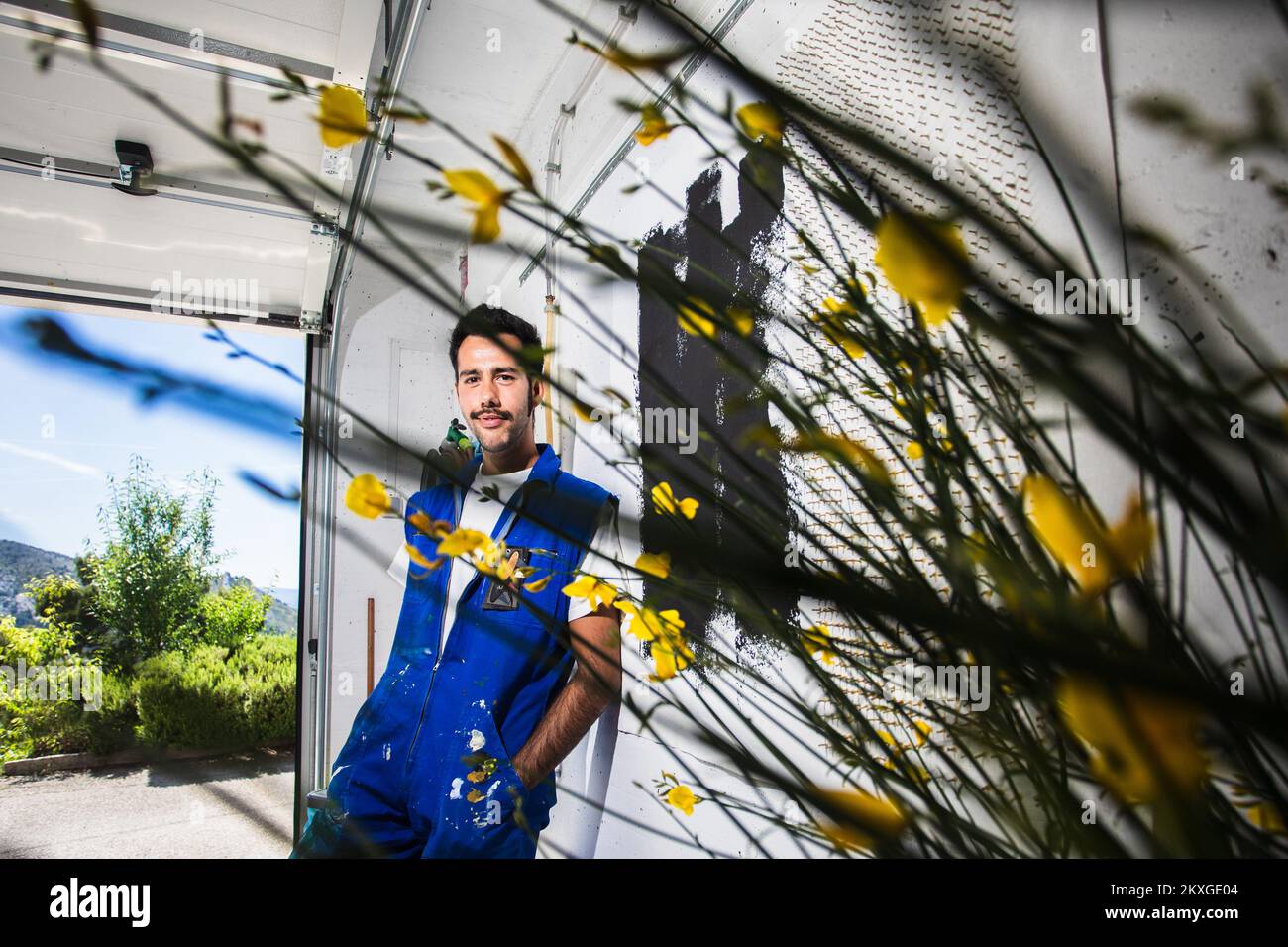 Young artist Stjepan Jukic is pictured in his studio garage in Klis ...