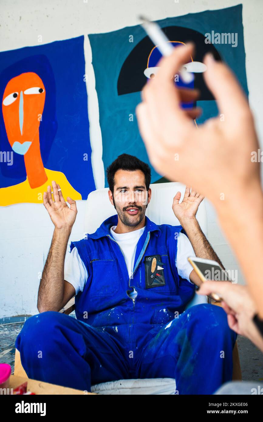 Young artist Stjepan Jukic is pictured in his studio garage in Klis ...