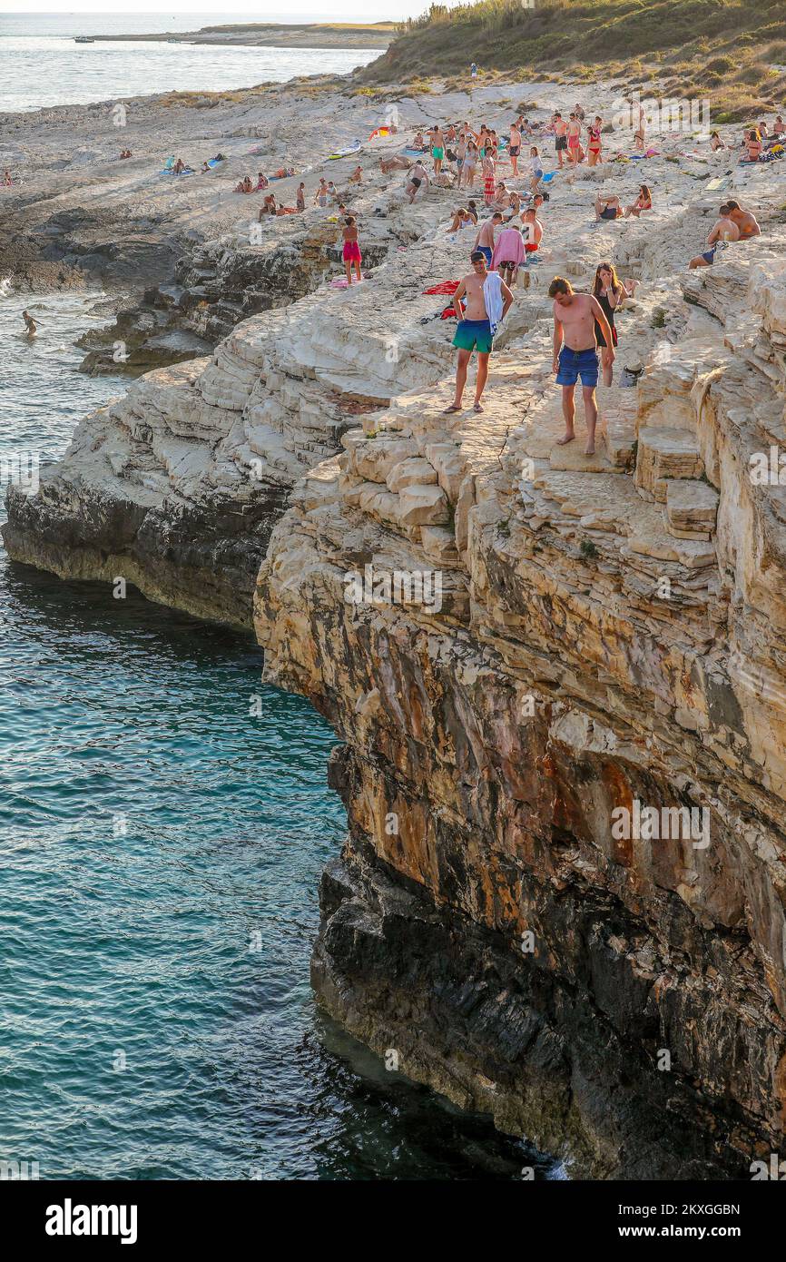 Tourists enjoy at Kamenjak Peninsula or Cape Kamenjak also known as the ...