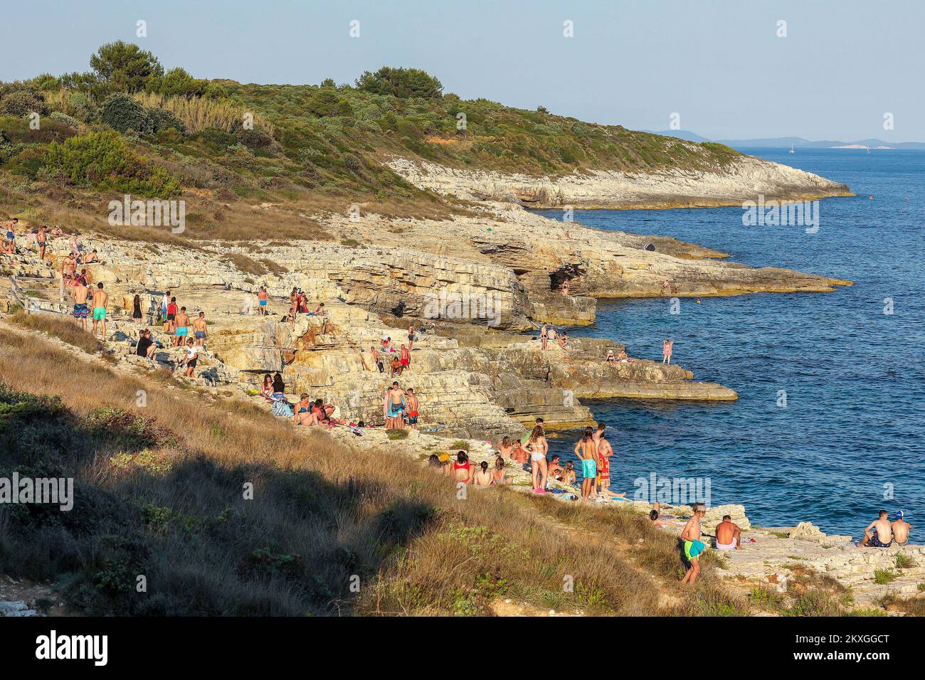 Tourists enjoy at Kamenjak Peninsula or Cape Kamenjak also known as the ...