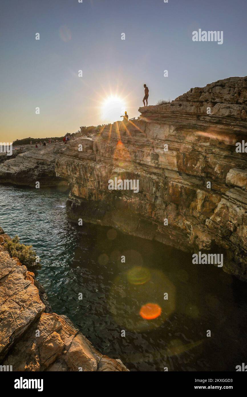 Tourists enjoy at Kamenjak Peninsula or Cape Kamenjak also known as the ...