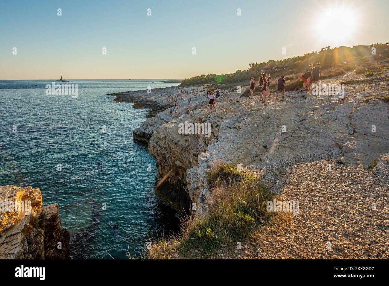 Tourists enjoy at Kamenjak Peninsula or Cape Kamenjak also known as the ...