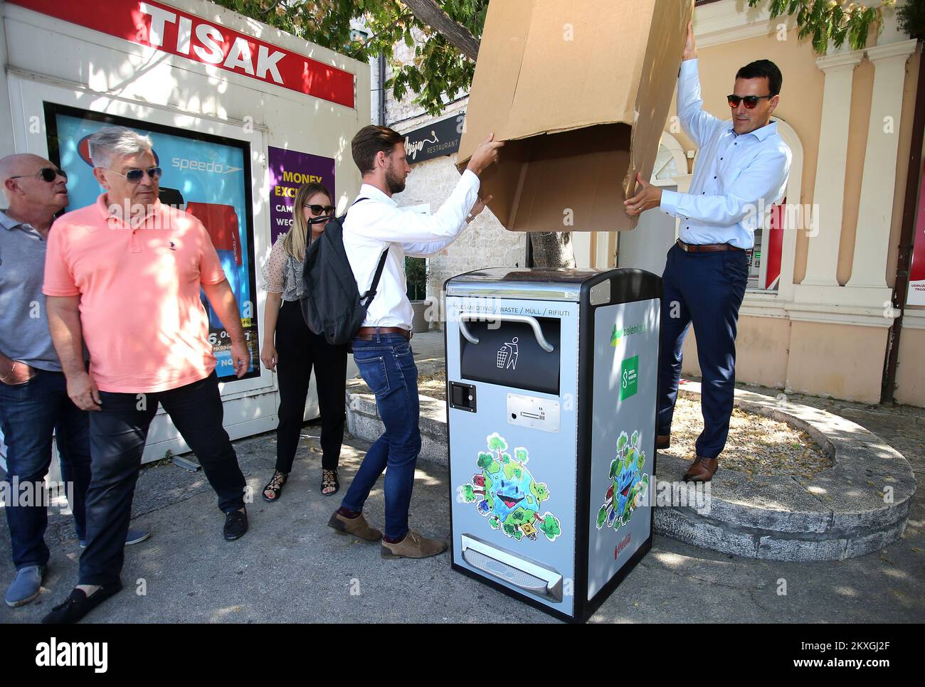 Three Big Belly Solar Compactor waste and recycling bins set up on ...