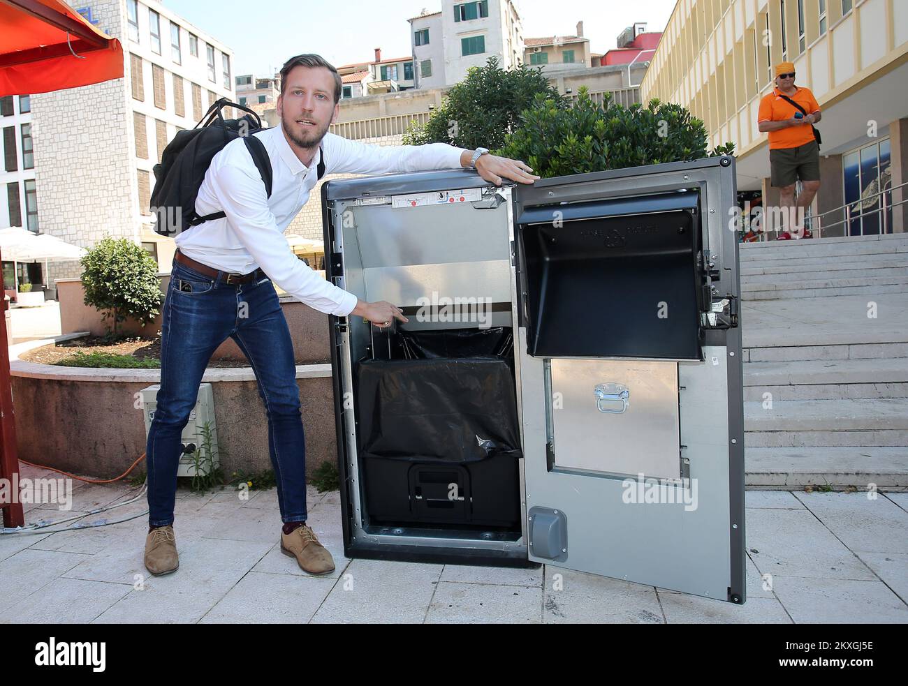 Three Big Belly Solar Compactor waste and recycling bins set up on ...