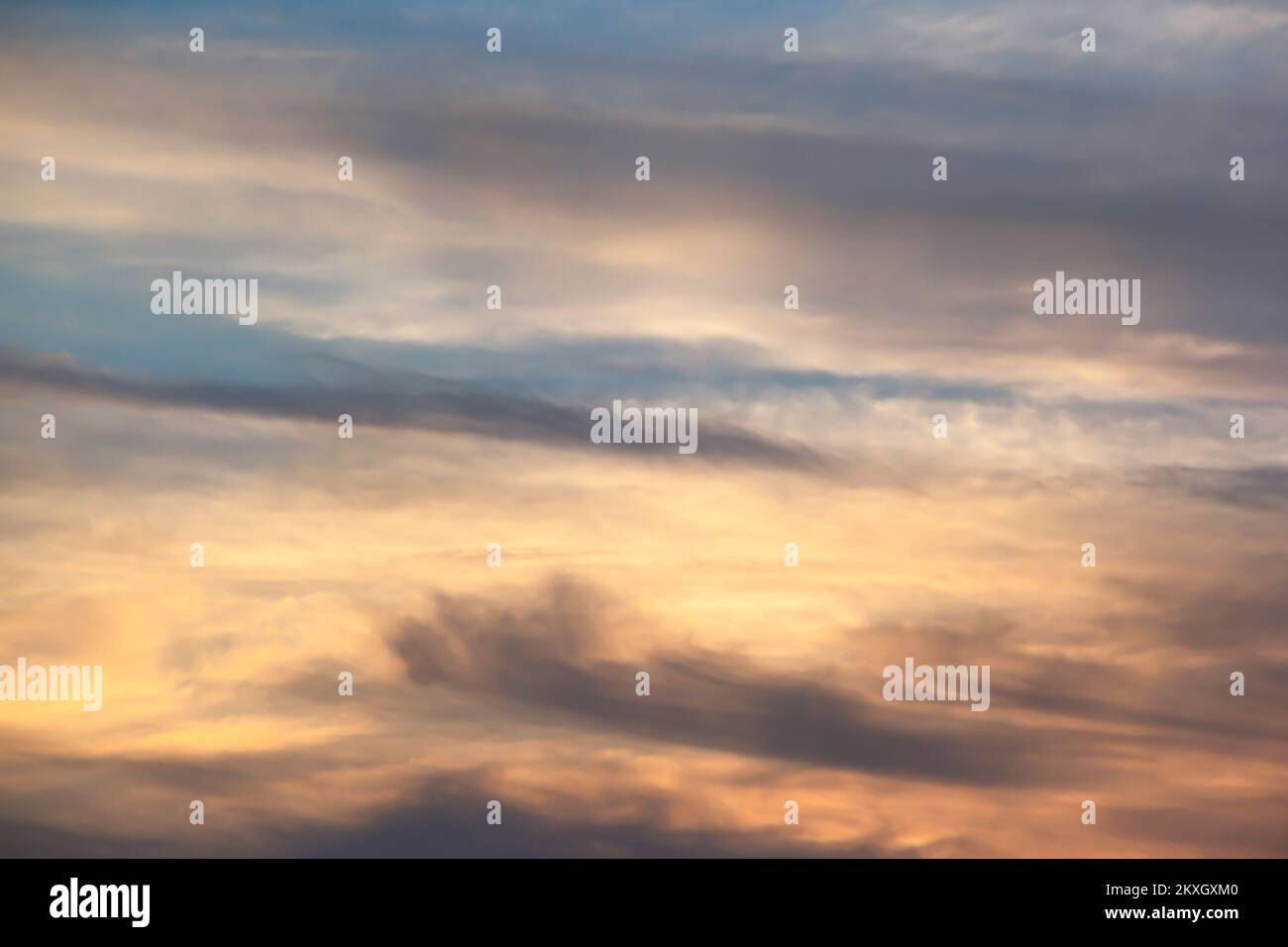 Soft lines of clouds in the sky at sunset, background Stock Photo - Alamy