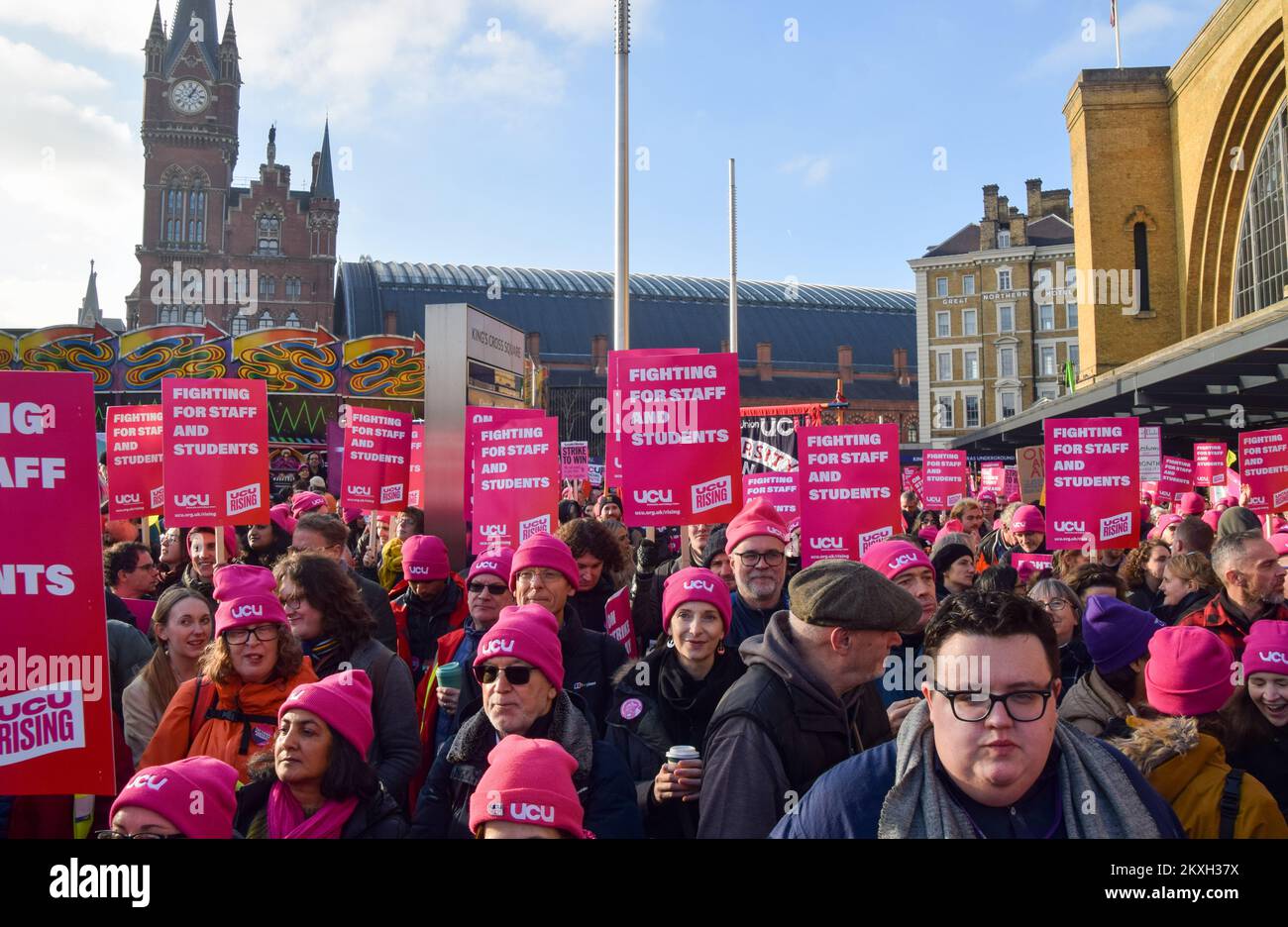 London, UK. 30th Nov, 2022. Protesters hold UCU strike placards during ...