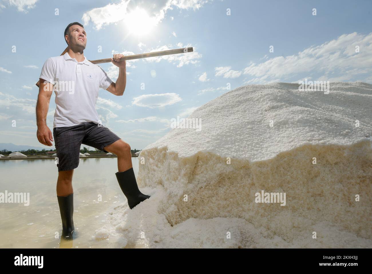 Salt harvesting at the Nin Saltworks. The natural Nin salt is a gift of ...
