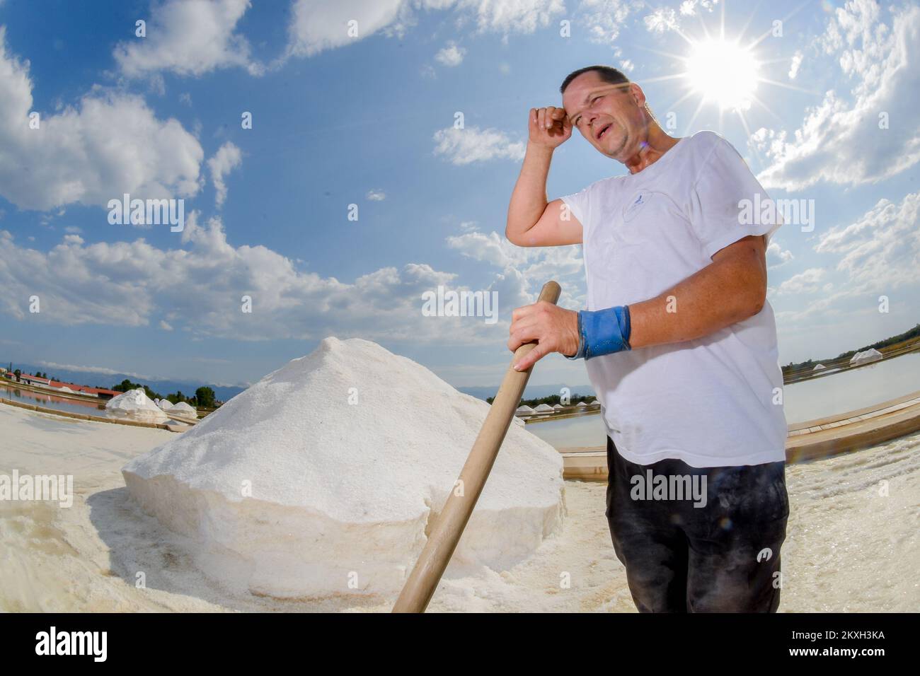 Salt harvesting at the Nin Saltworks. The natural Nin salt is a gift of ...
