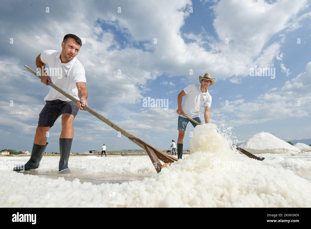 Salt harvesting at the Nin Saltworks. The natural Nin salt is a gift of ...