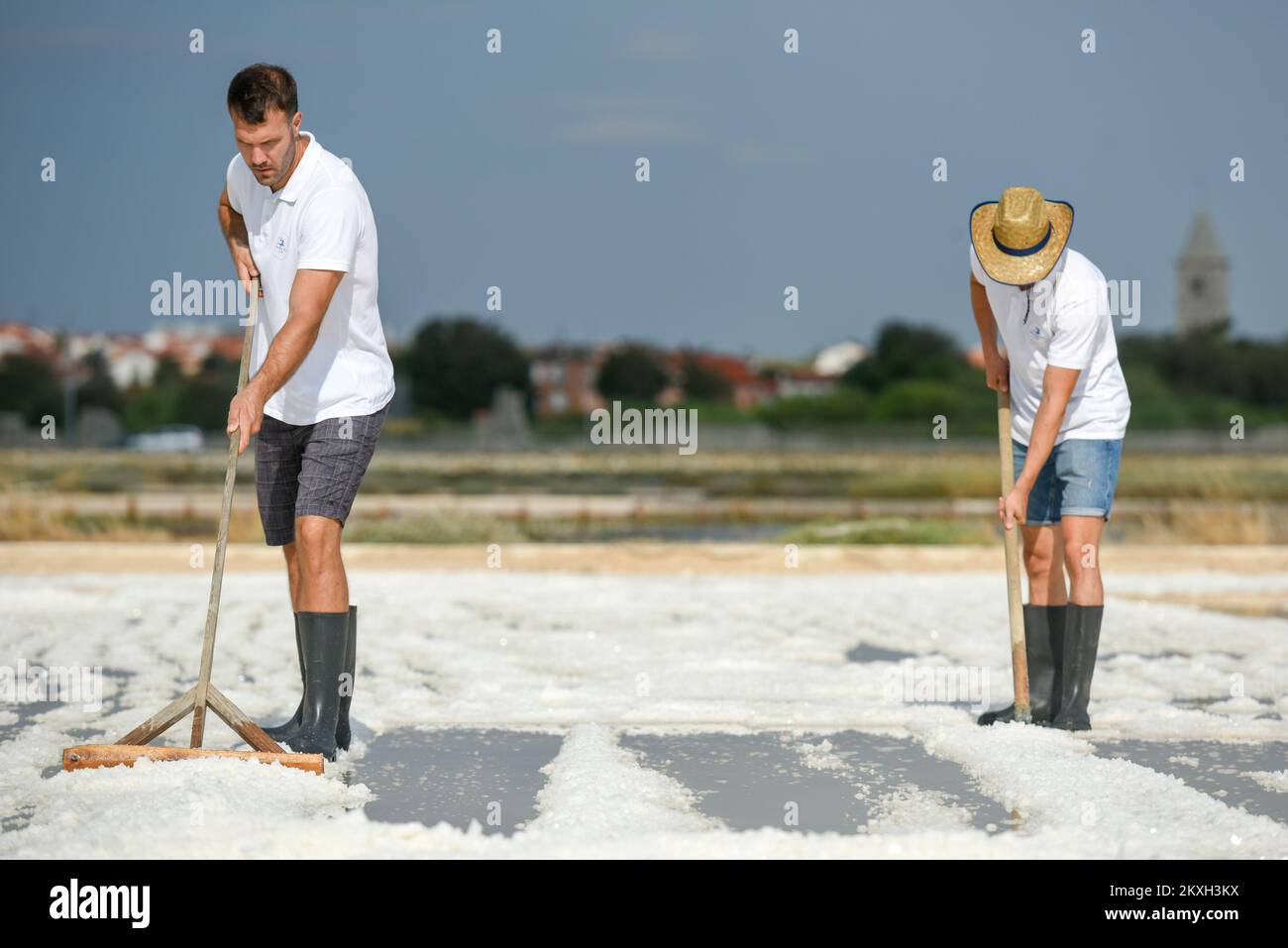Salt harvesting at the Nin Saltworks. The natural Nin salt is a gift of ...