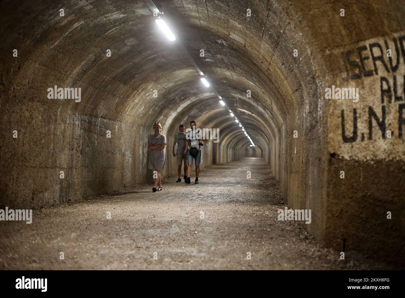 Tourists seen touring the Rijeka tunnel also known as TunelRi in Rijeka ...