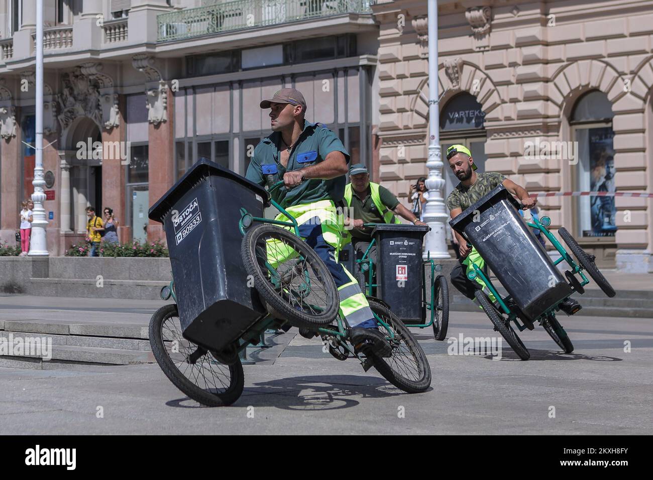 Traditional garbage-men on bicycles race on the streets of Croatia's ...