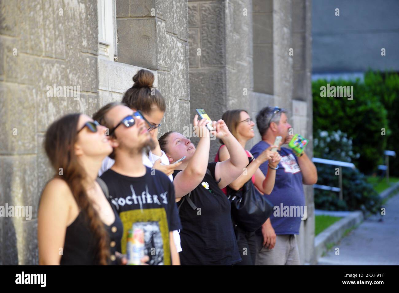 Members of the band Imset played hanging from the TR3 building on ...