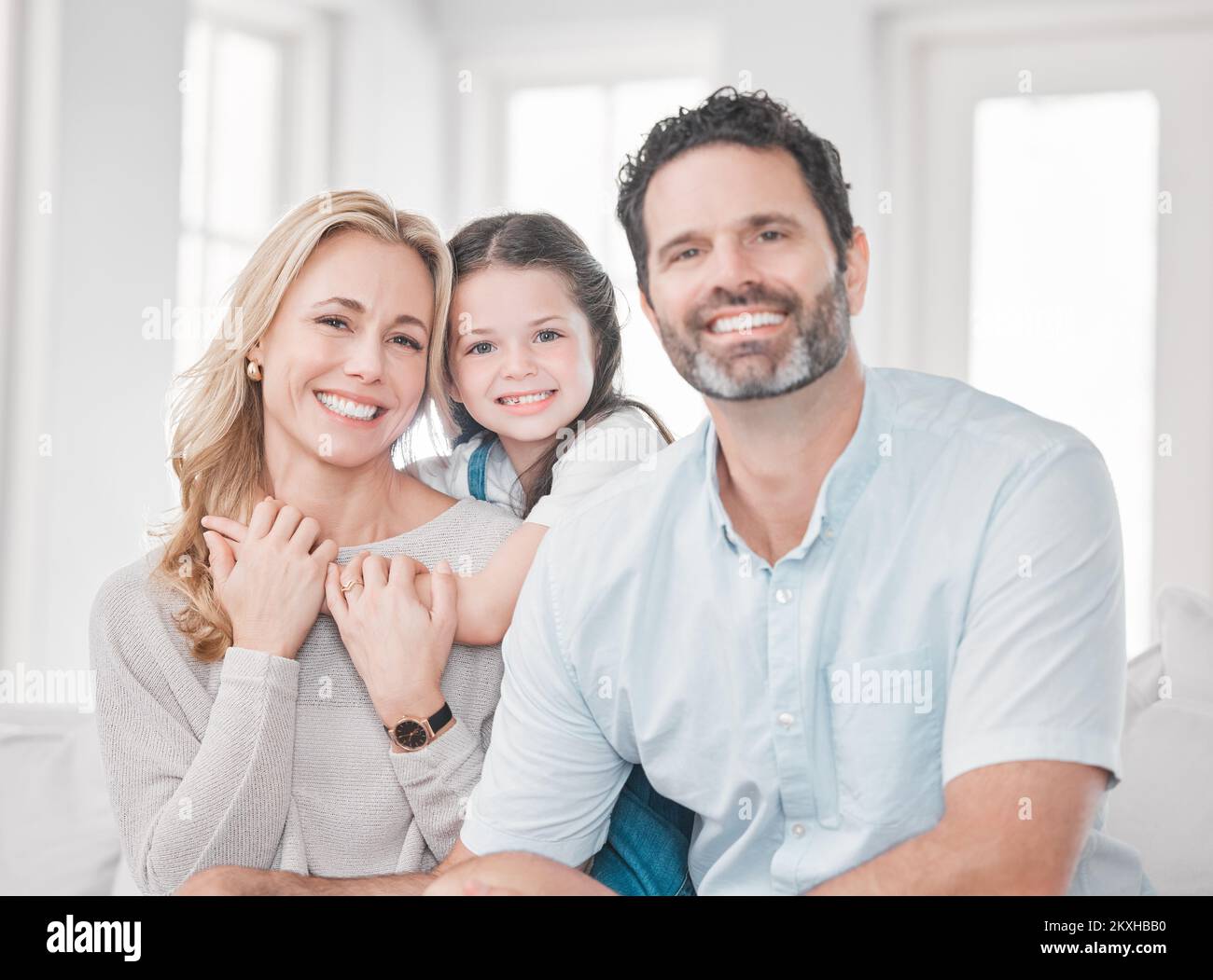 Family, love and relax on sofa together for quality time or ...