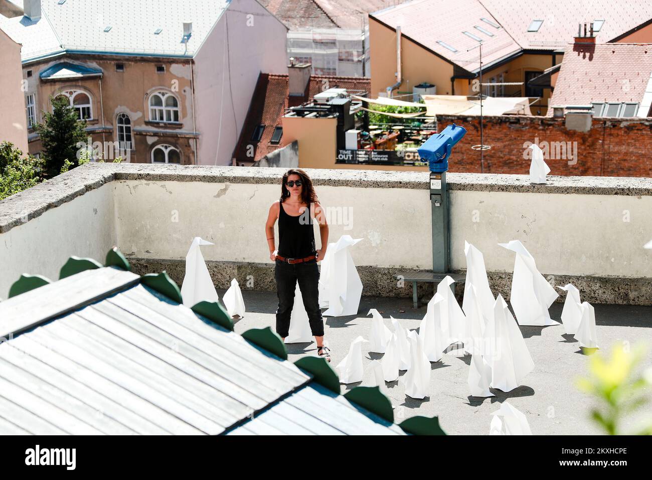 Photo taken on August 28, 2020. shows origami sculptures "Tourists" by ...