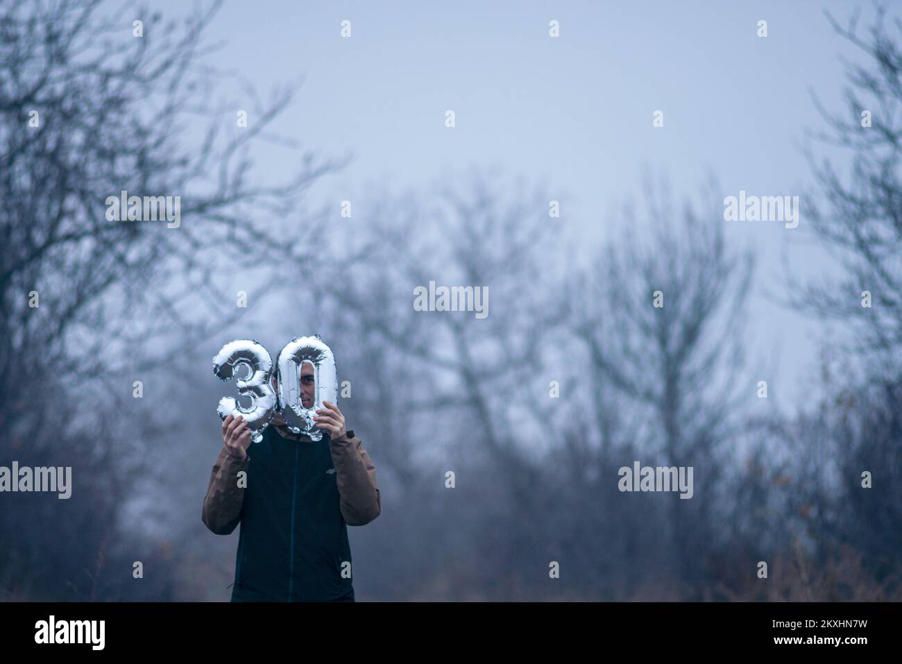 Cute guy celebrating 30th birthday man anniversary sad Adult helium ...