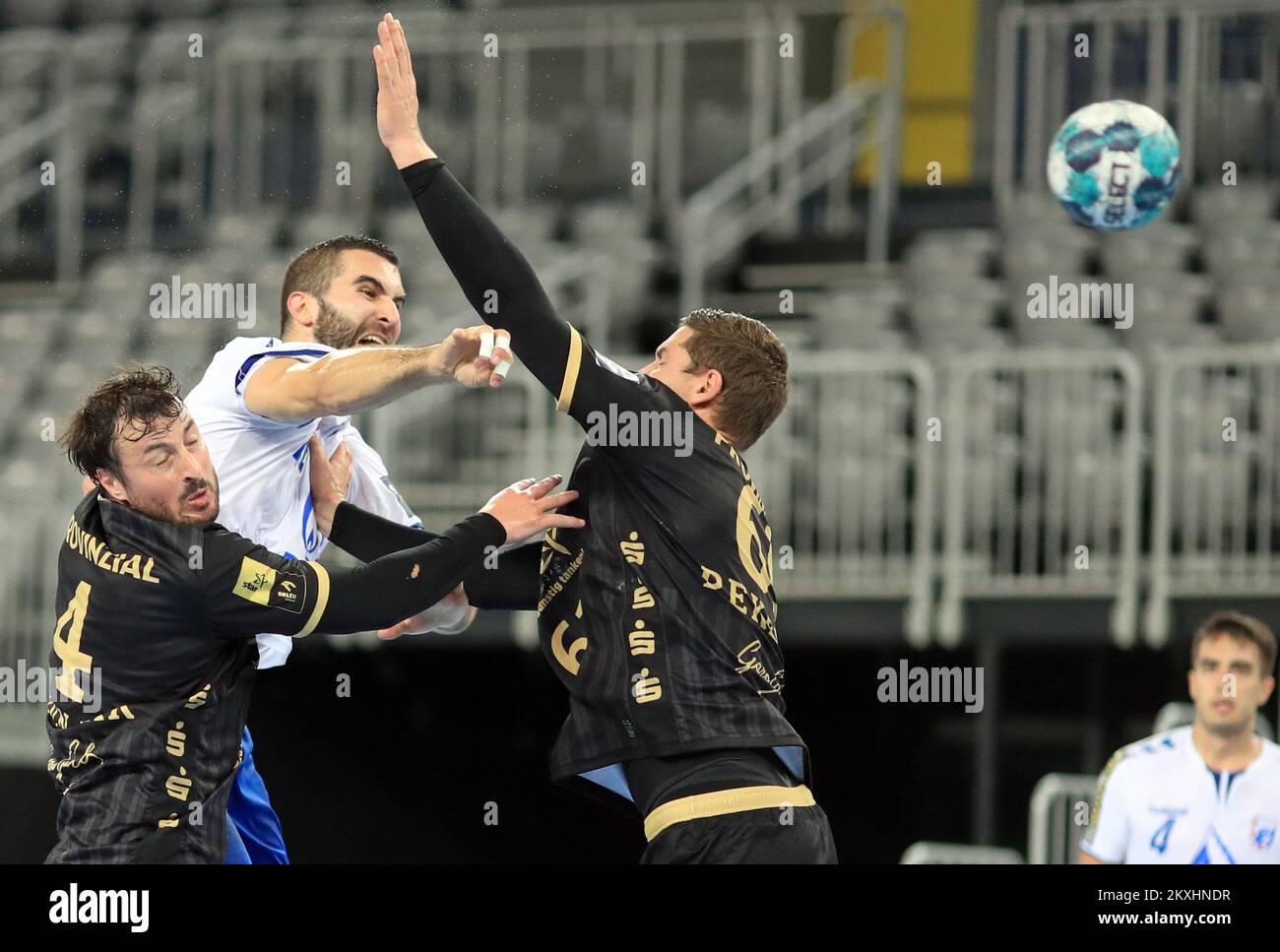 Milos Bozovic of PPD Zagreb and Domagoj Duvnjak of THW Kiel in action ...