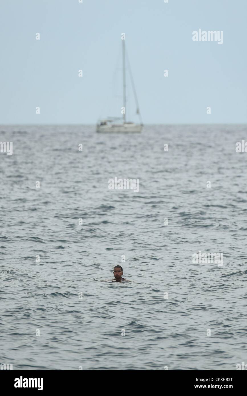 Man swim on first day of the autumn, in Zadar, Croatia, on September 22 ...