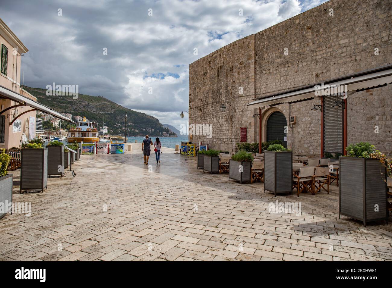 Tourists seen walking through the old city port of Dubrovnik, Croatia ...