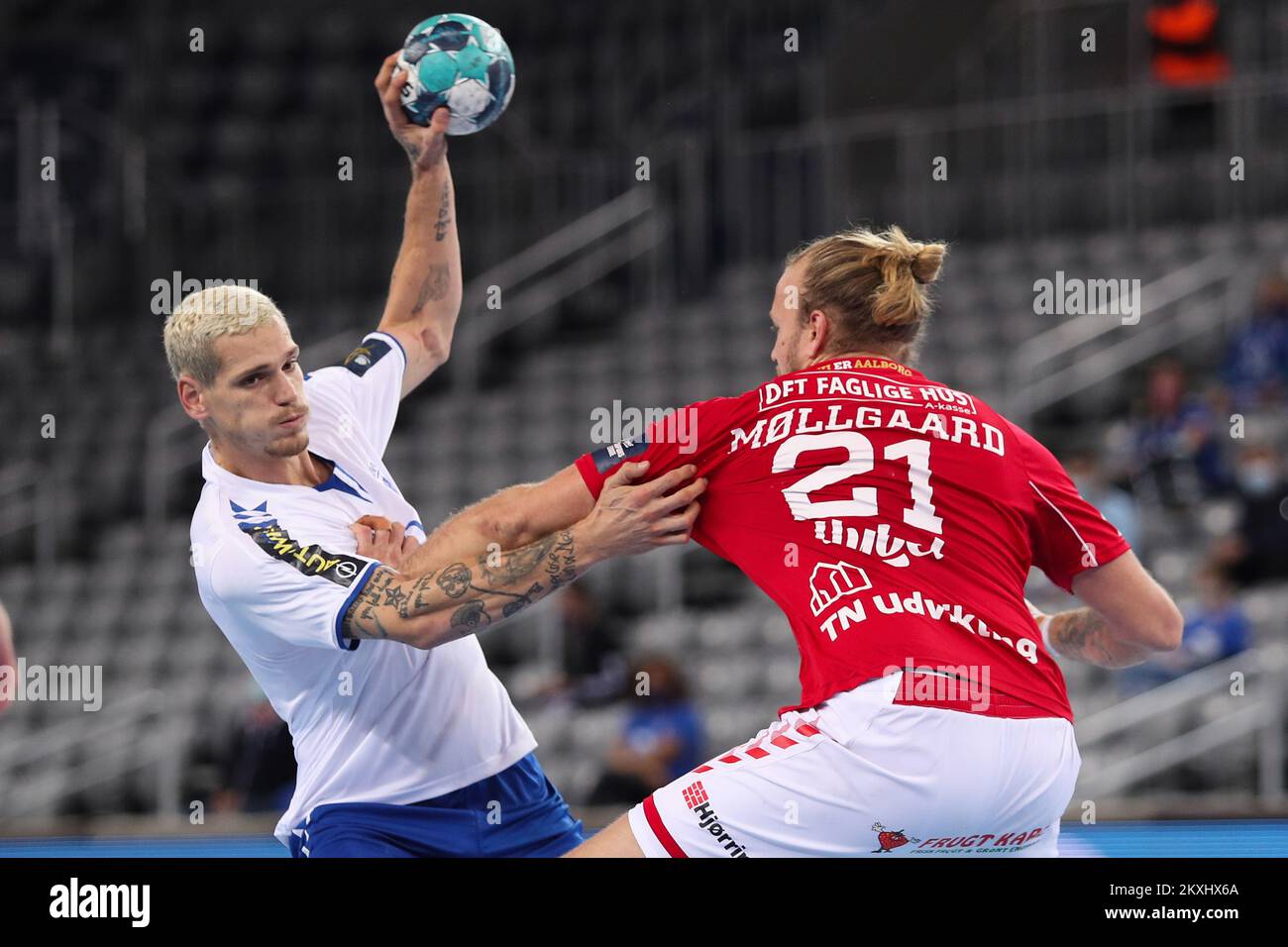 Mario Vuglac of HC PPD Zagreb and Henrik MÃ¸llgaard Jensen of Aalborg ...