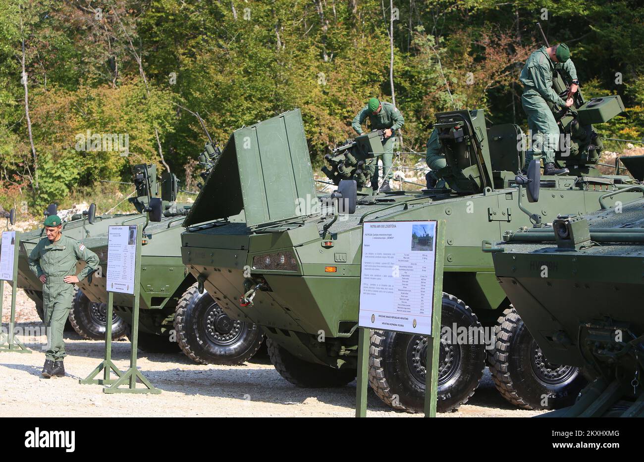 Servicemen of the BOV Patria CRO 30 L armored combat vehicle give an ...