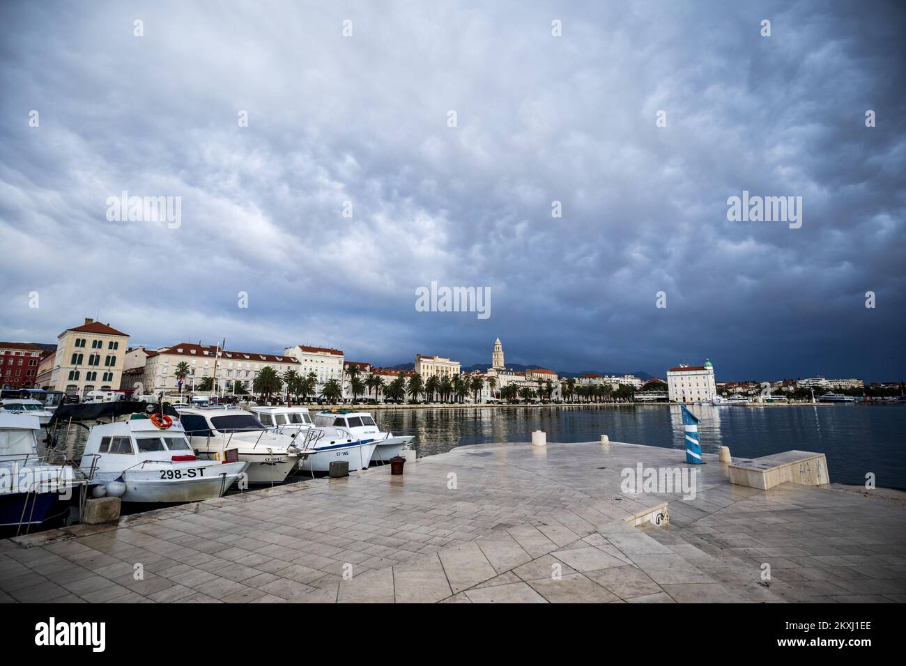 The sun shone on the streets of the city after all-day rain and autumn ...