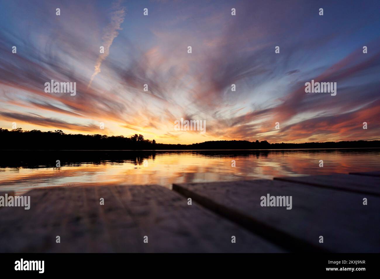 Sunset on the dock Stock Photo - Alamy