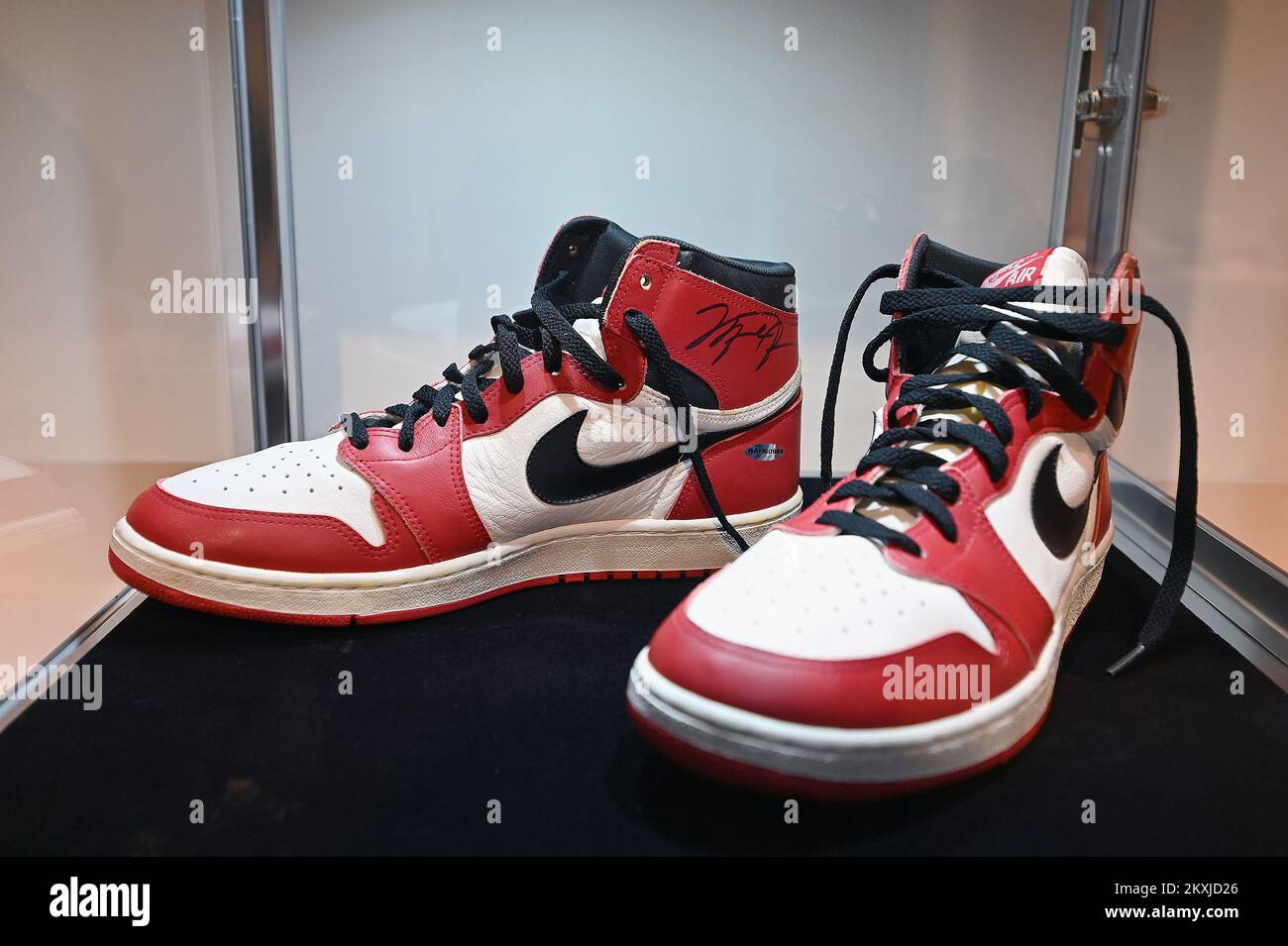 A pair of non-game worn Nike Air Jordan 1’s, autographed my famed ...