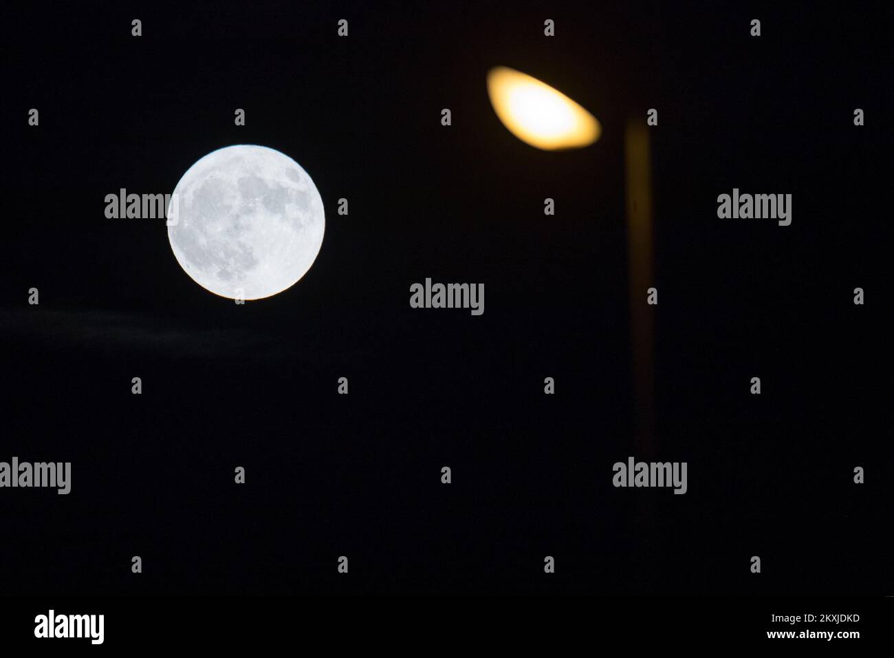 Photo taken on October 31, 2022 shows "blue moon" over Zagreb, Croatia ...