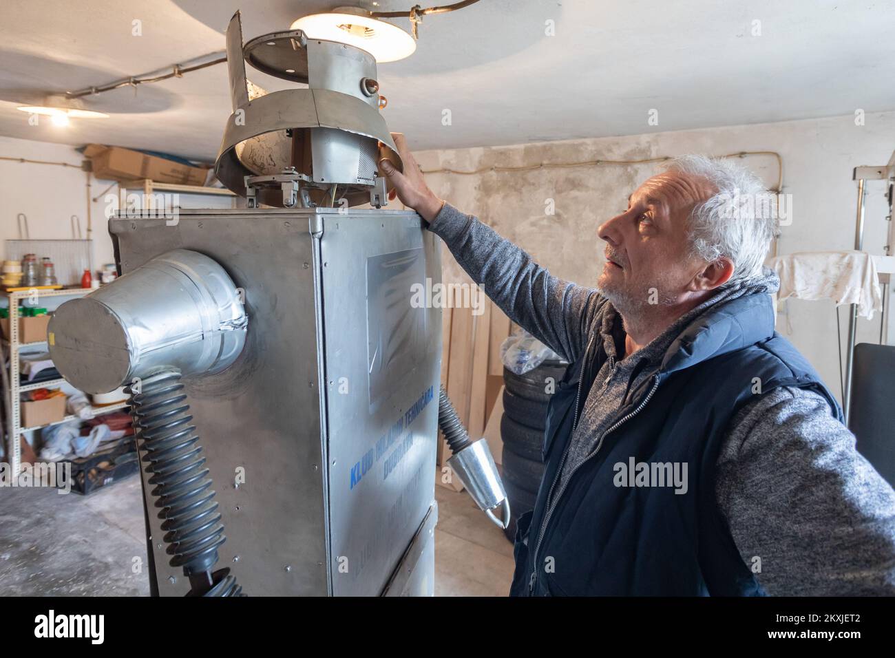 Mario Stipandic with a robot from 1968 in Zagreb, Croatia on May 16 ...