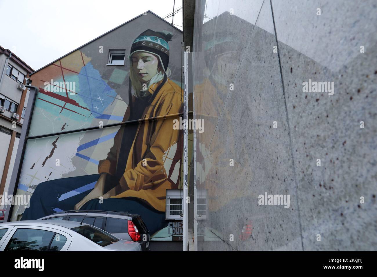 Street artists Lonac and Chez 186 made a new mural on the facade of the ...