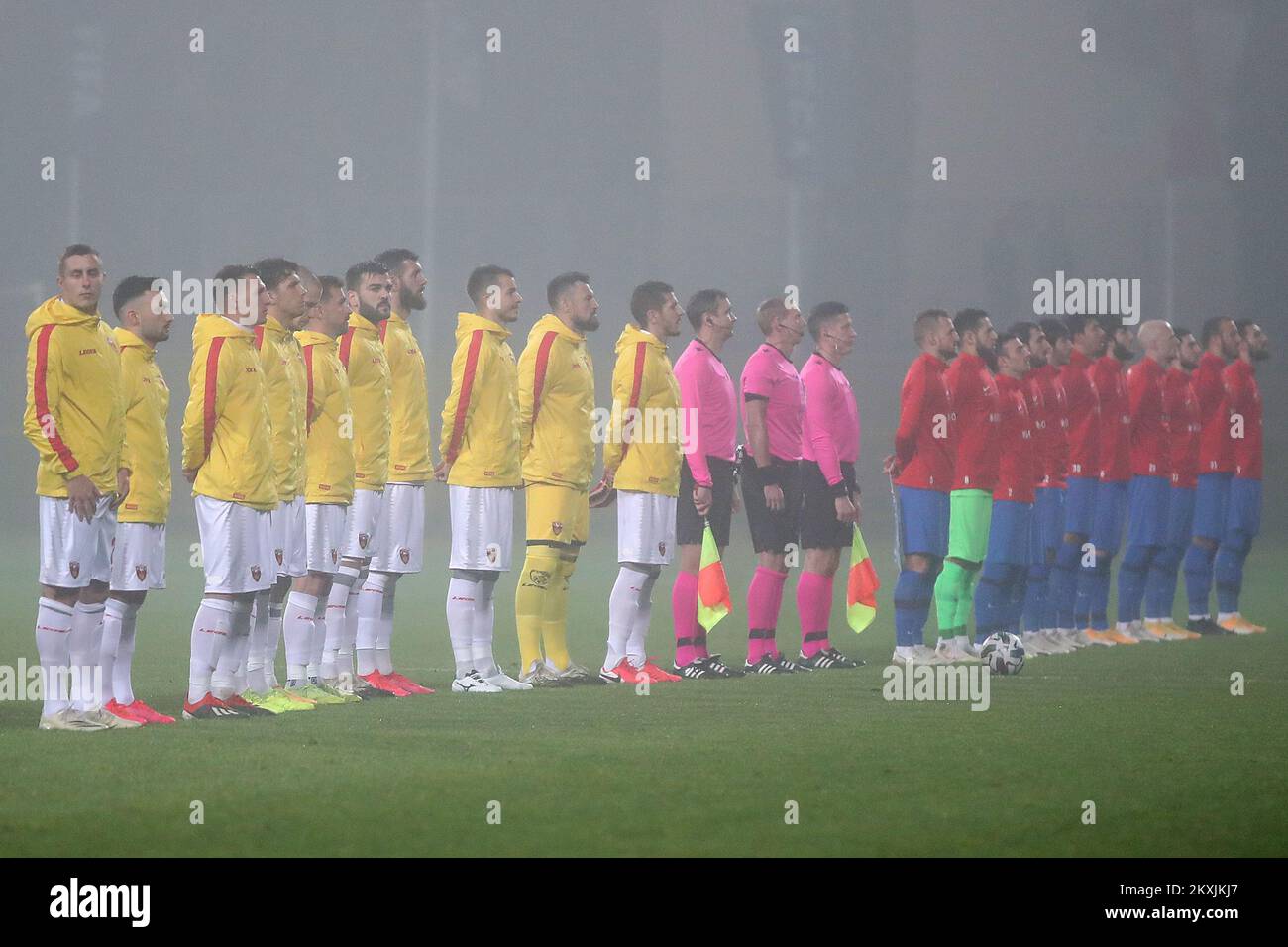 Players of Montenegro sing their national anthem prior the UEFA Nations ...