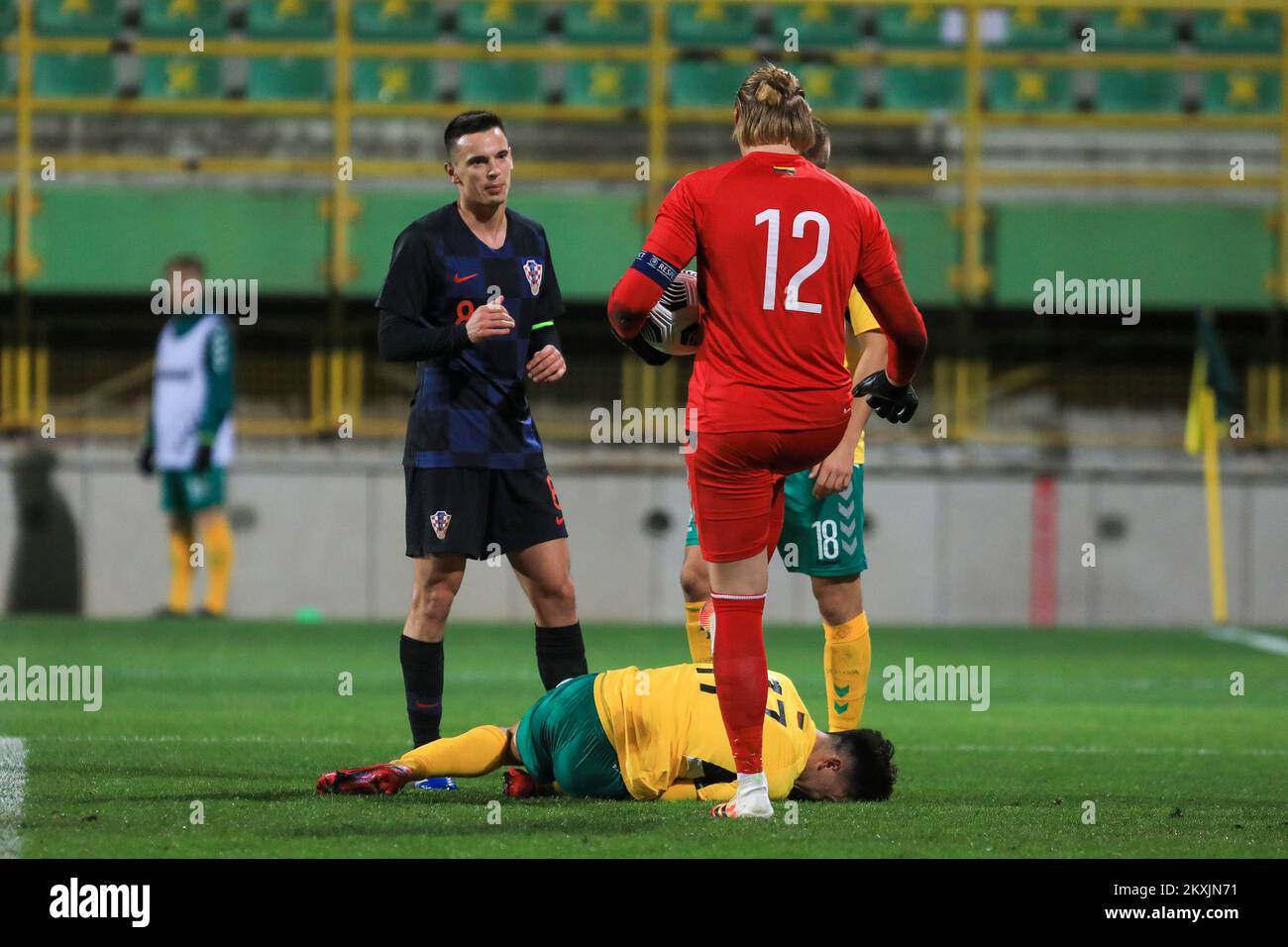 Titas Milasius of Lithuania is down injured during the UEFA Euro Under ...