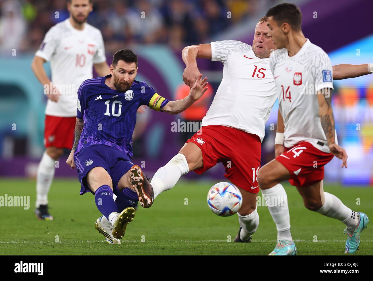 Doha, Qatar. 30th Nov, 2022. Lionel Messi of Argentina gets a shot away ...