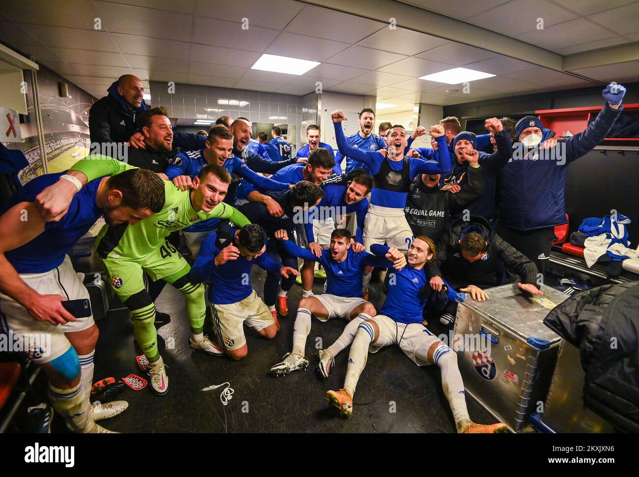 Football players of Dinamo celebrated the victory in the locker room ...