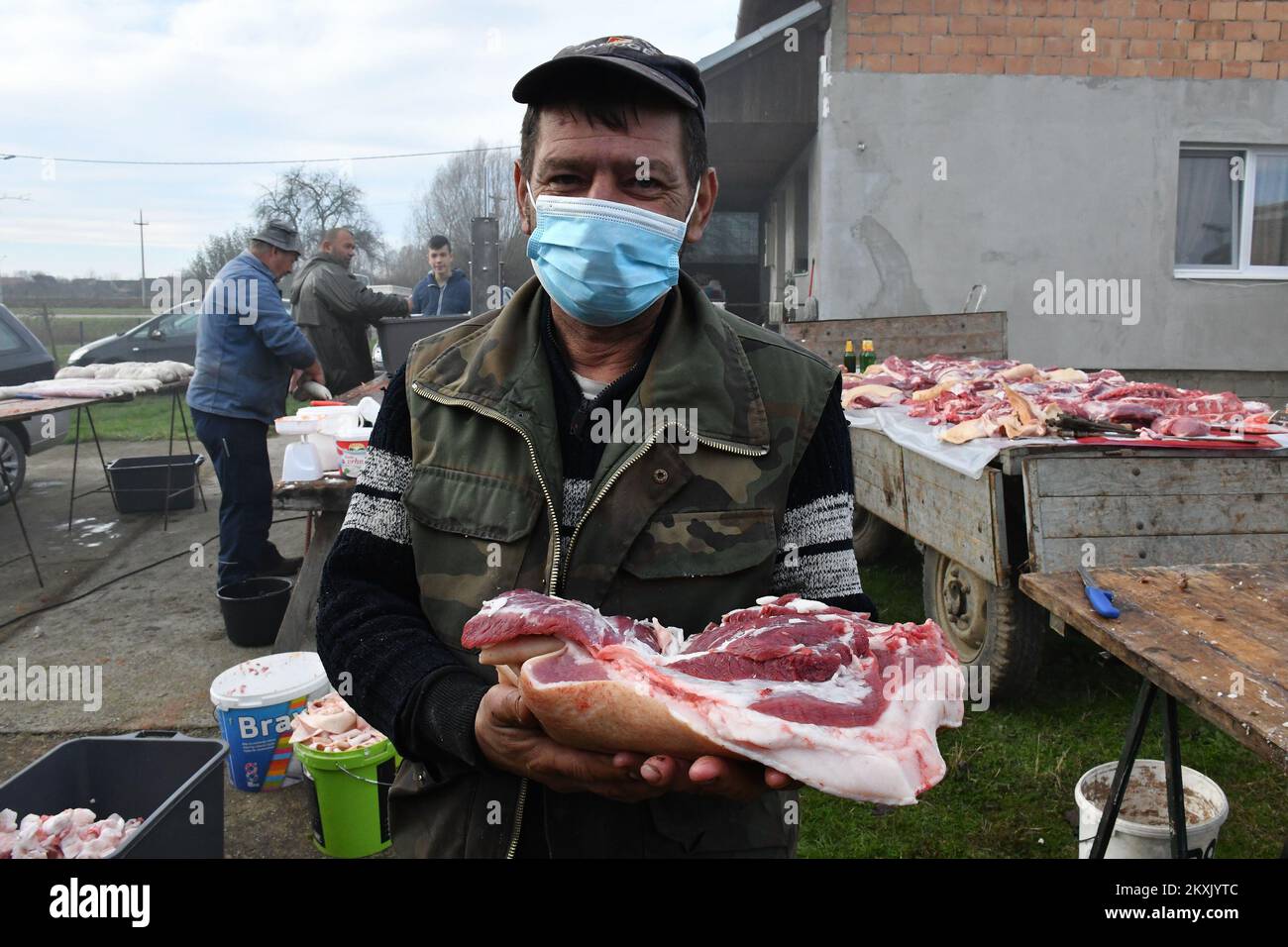 Man holds pig in hi-res stock photography and images - Alamy