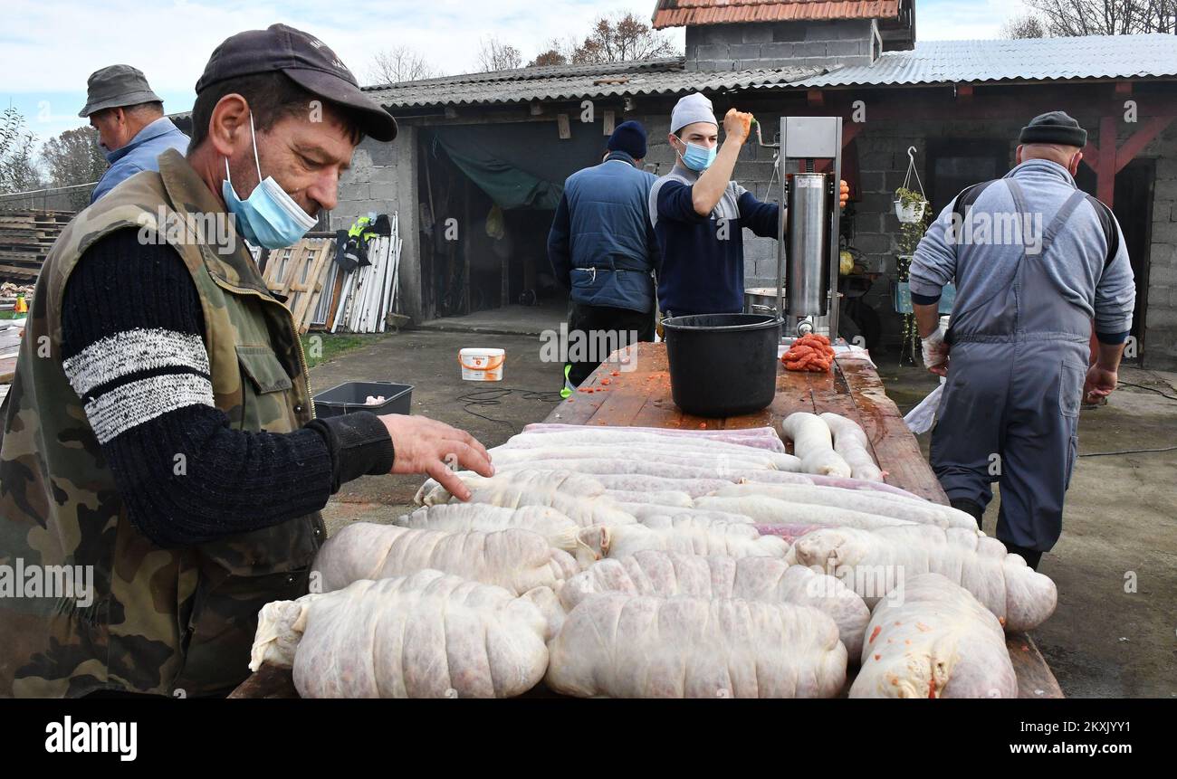 Blood sausages are pictured during traditional Slavonian pig slaugher ...