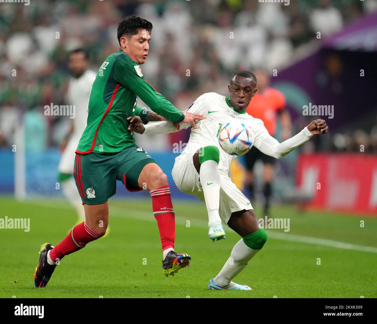 Mexico's Edson Alvarez (left) and Saudi Arabia's Saud Abdulhamid battle ...
